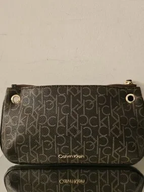Calvin Klein | Bags | Calvin Klein Brown Monogram Logo Wristlet Clutch ...